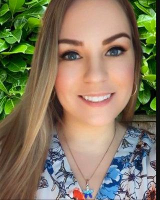 Photo of Justina Tambeau, LMHC, Counselor